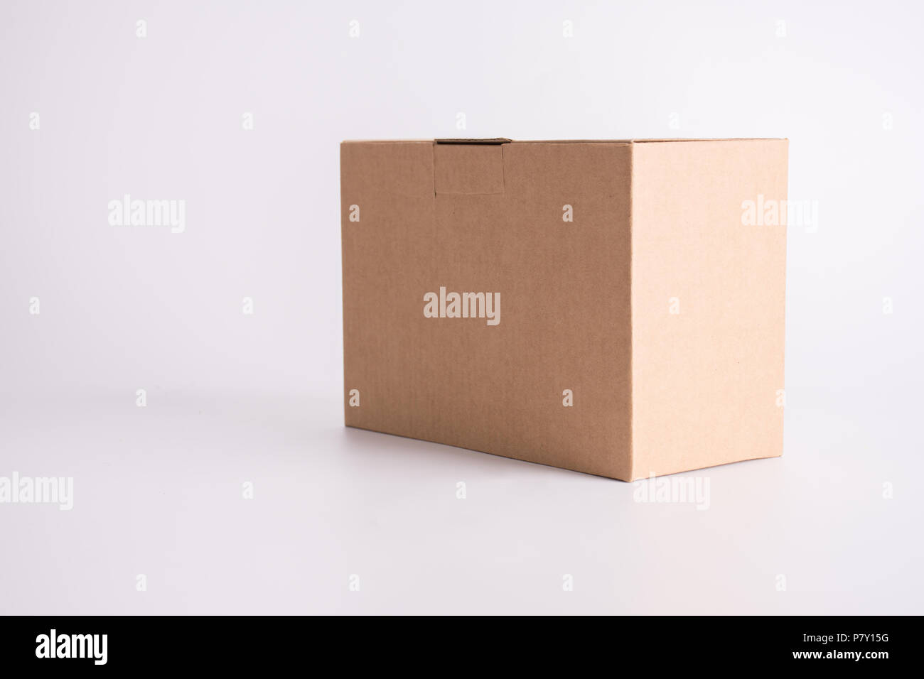 Brown paper box on white background. Parcel and post delivery concept ...