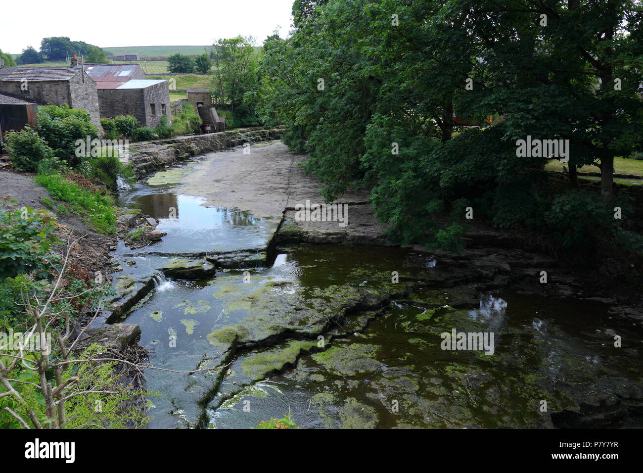 The River Bain with an almost dried up river bed at Bainbridge in the ...