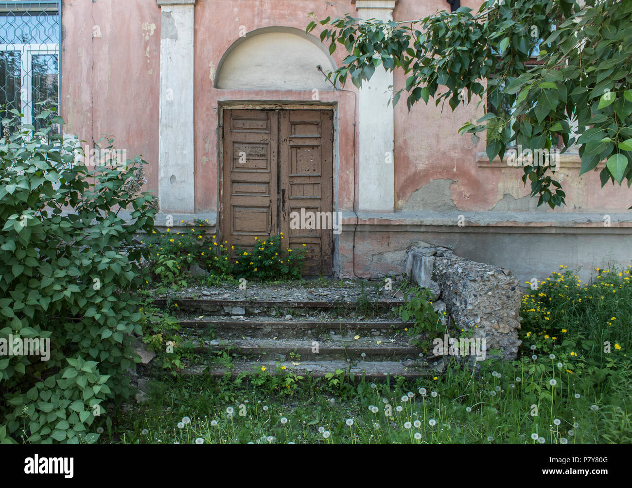 The front door of the old house. Old architecture. Antique style Stock ...