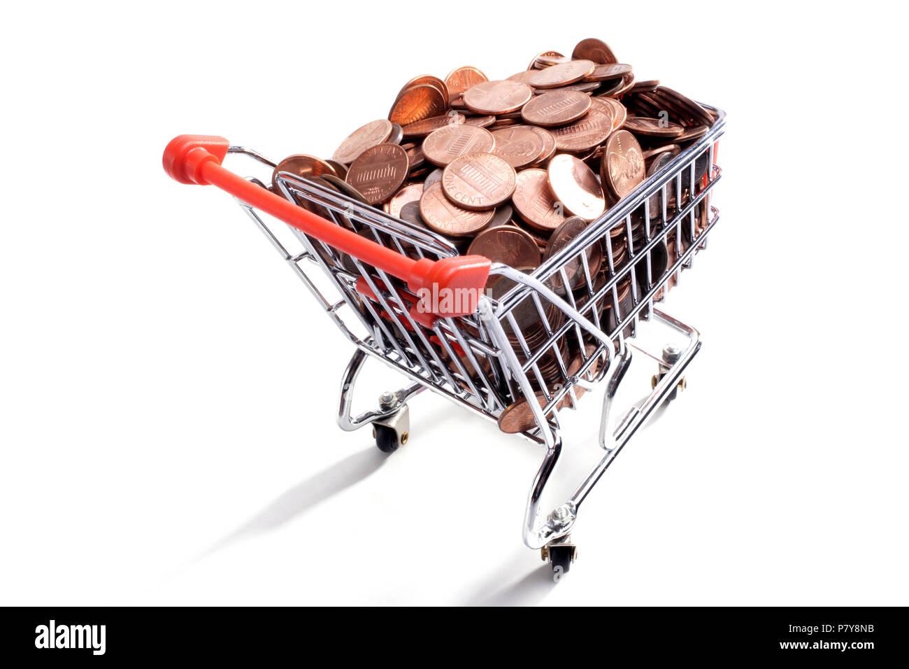 an image of coins in shopping cart Stock Photo - Alamy
