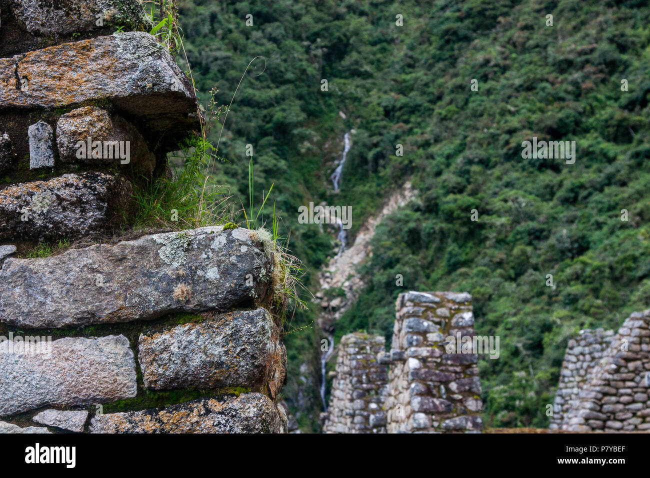 Waterfall from stone ruins Inca town Stock Photo - Alamy