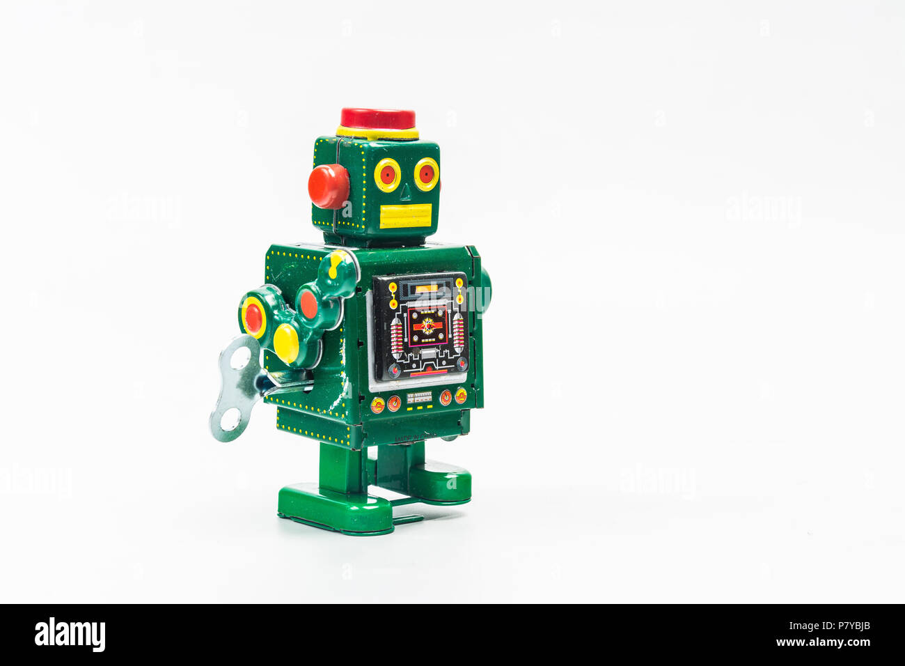 robot tin toy on white background Stock Photo - Alamy