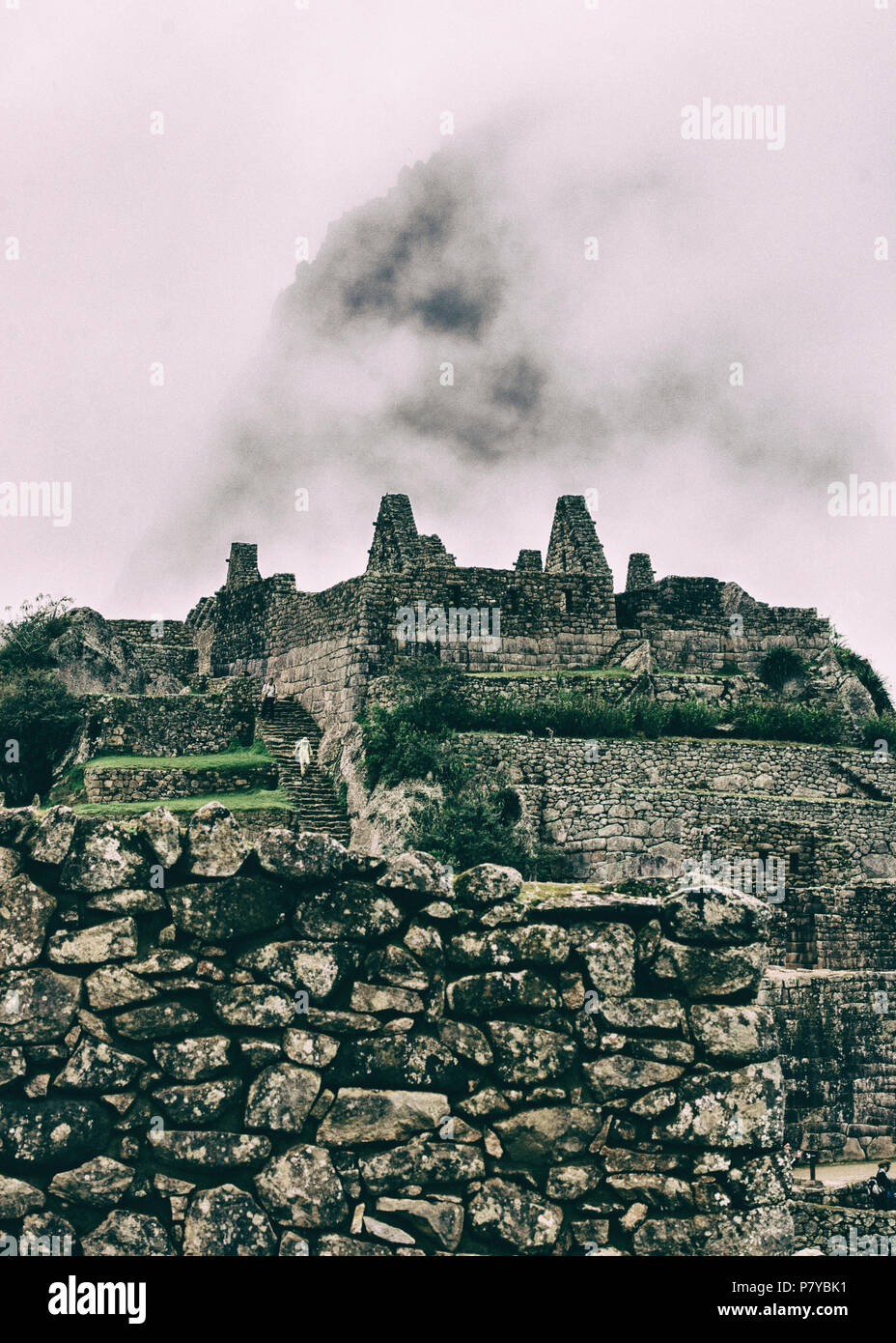 Vertical view of a stone city lost in nature Stock Photo - Alamy