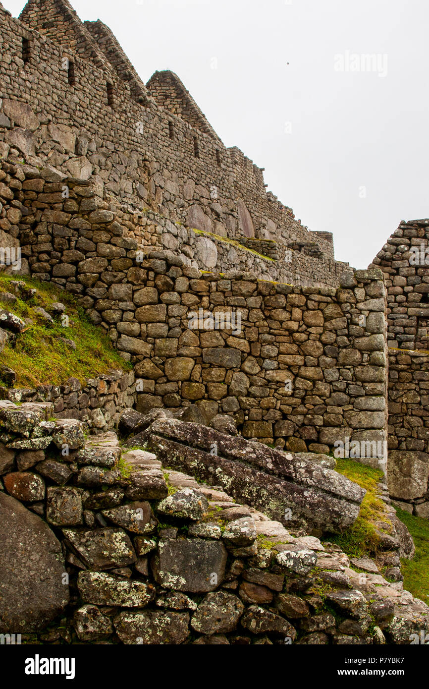 Stone walls of an Inca castle in the mountains Stock Photo - Alamy