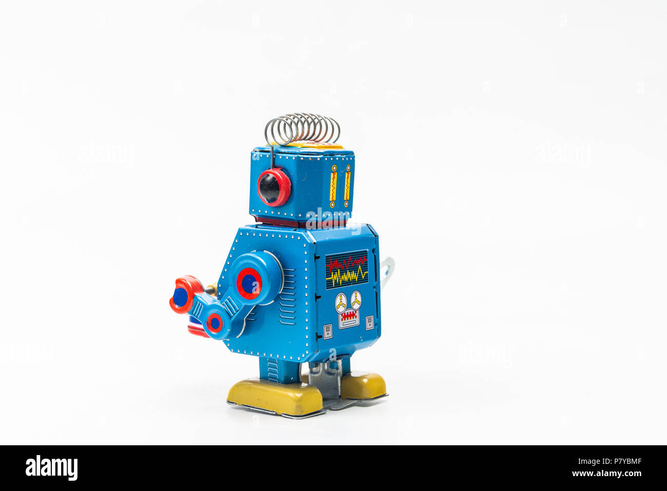 robot tin toy on white background Stock Photo - Alamy