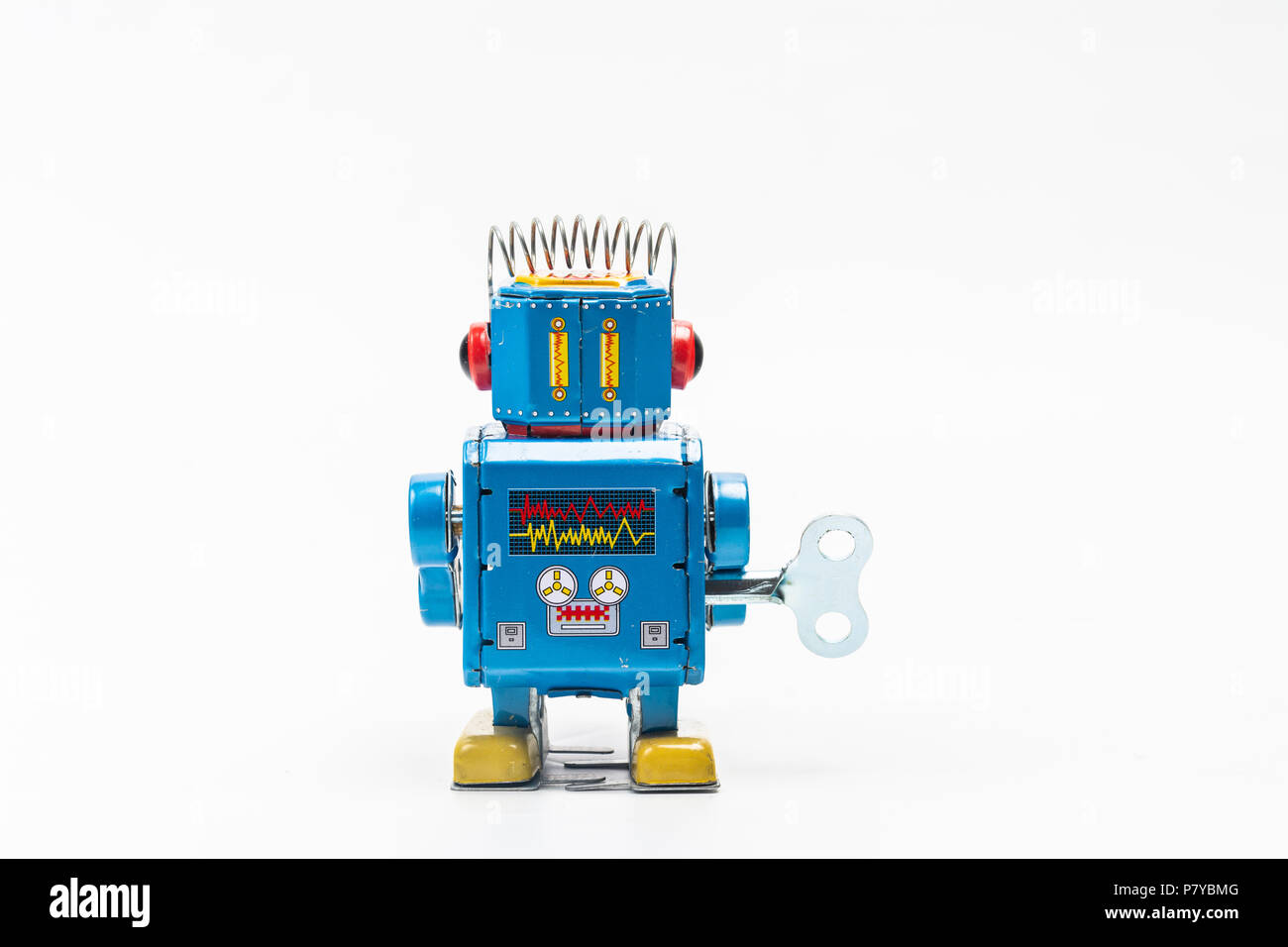 robot tin toy on white background Stock Photo - Alamy