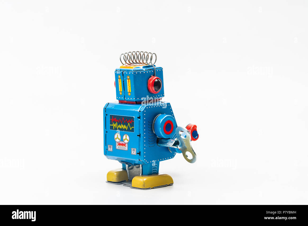 robot tin toy on white background Stock Photo - Alamy
