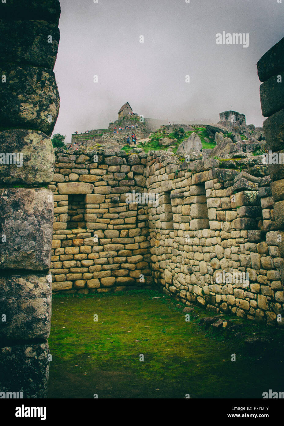 View of tourists from inside an ancient ruins Stock Photo - Alamy