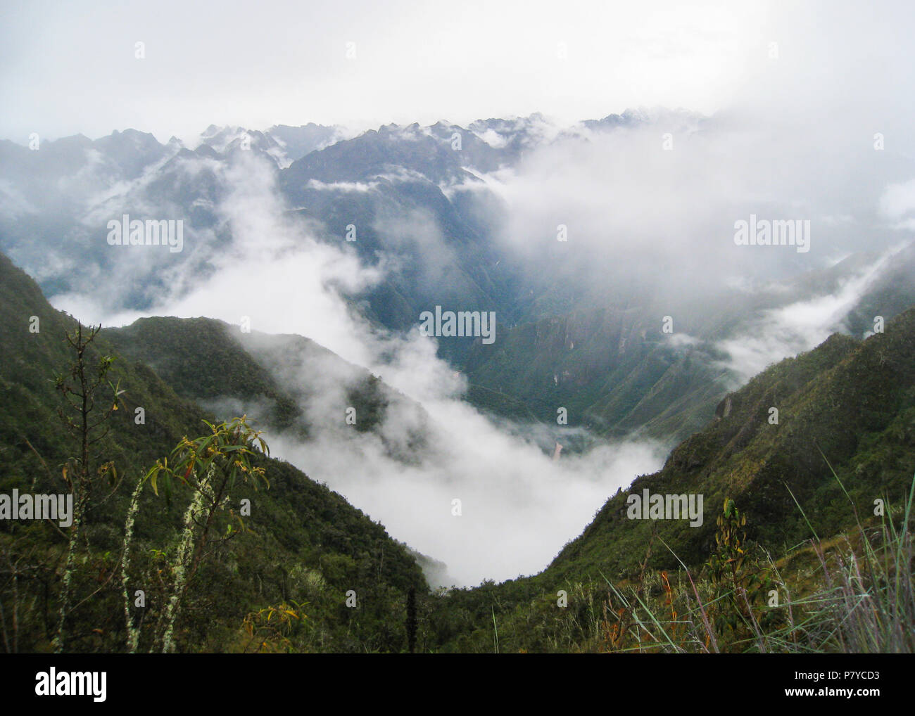 The Andes mountains and low clouds from the Inca Trail. Peru Stock ...