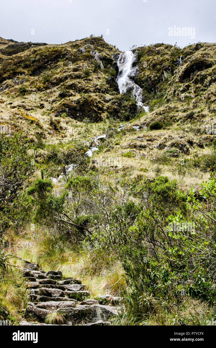 Waterfall on the stone paved path Inca Trail Stock Photo - Alamy