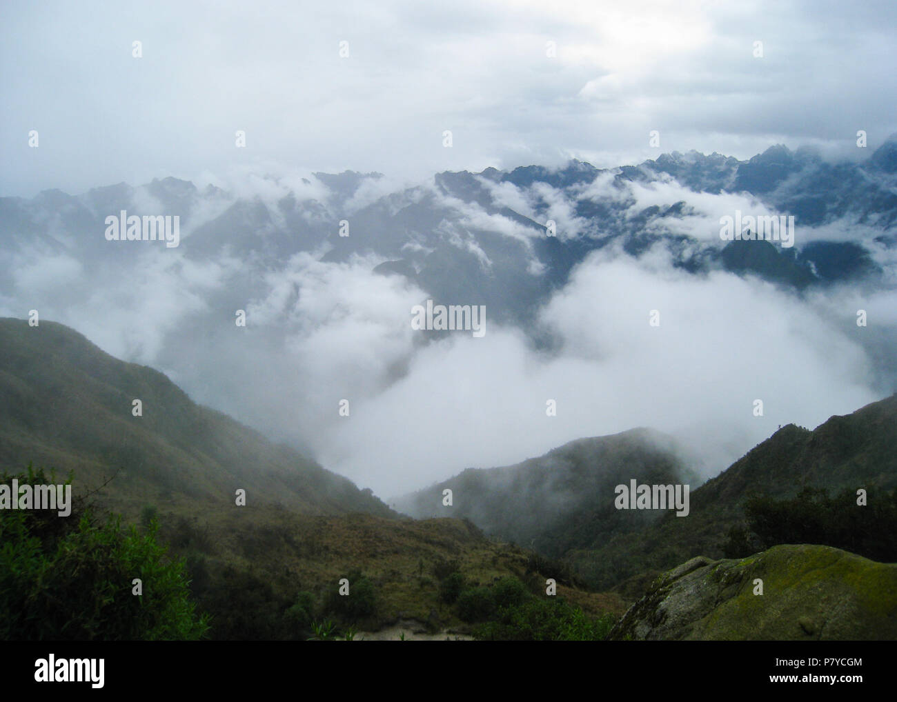 The Andes mountains and low clouds from the Inca Trail. Peru Stock ...