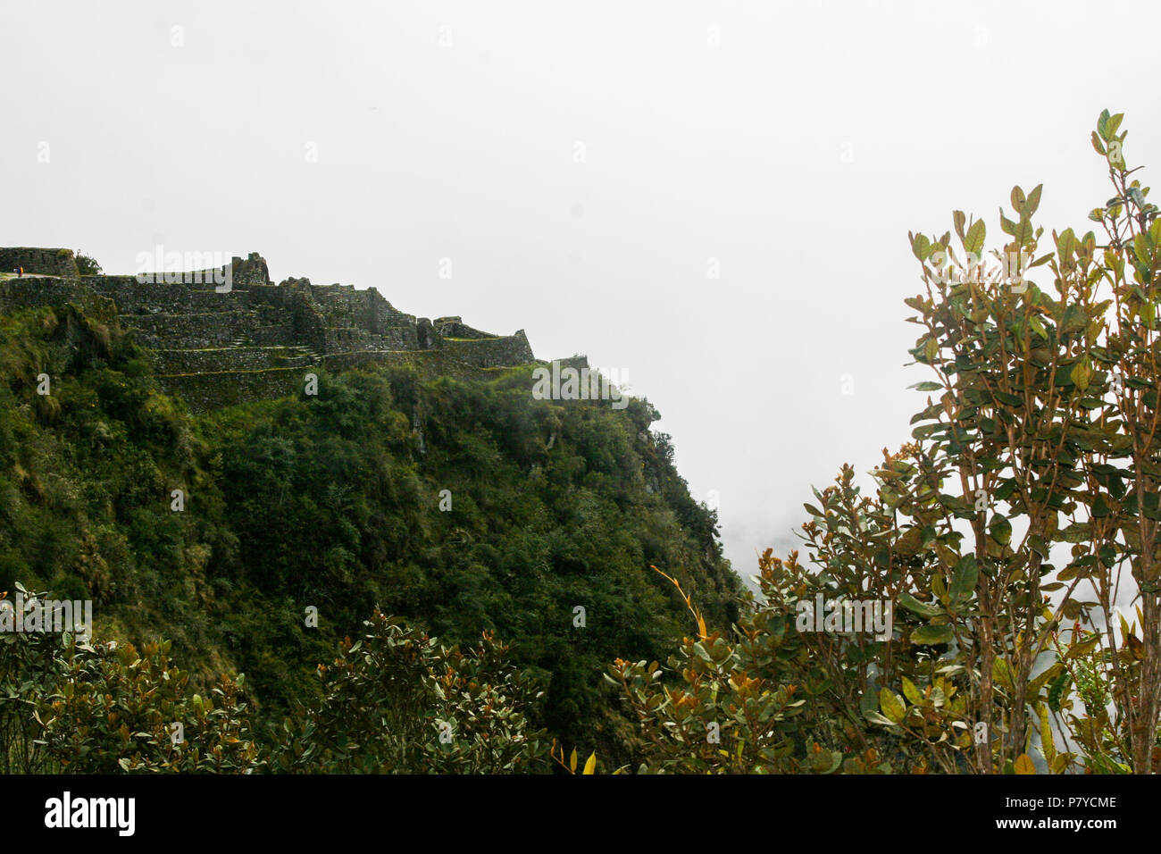 Ancient Inca ruins on a cliff Stock Photo - Alamy