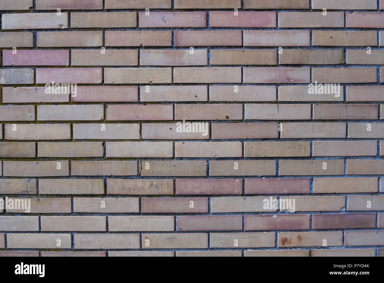 Red and yellow brick wall texture background Stock Photo - Alamy