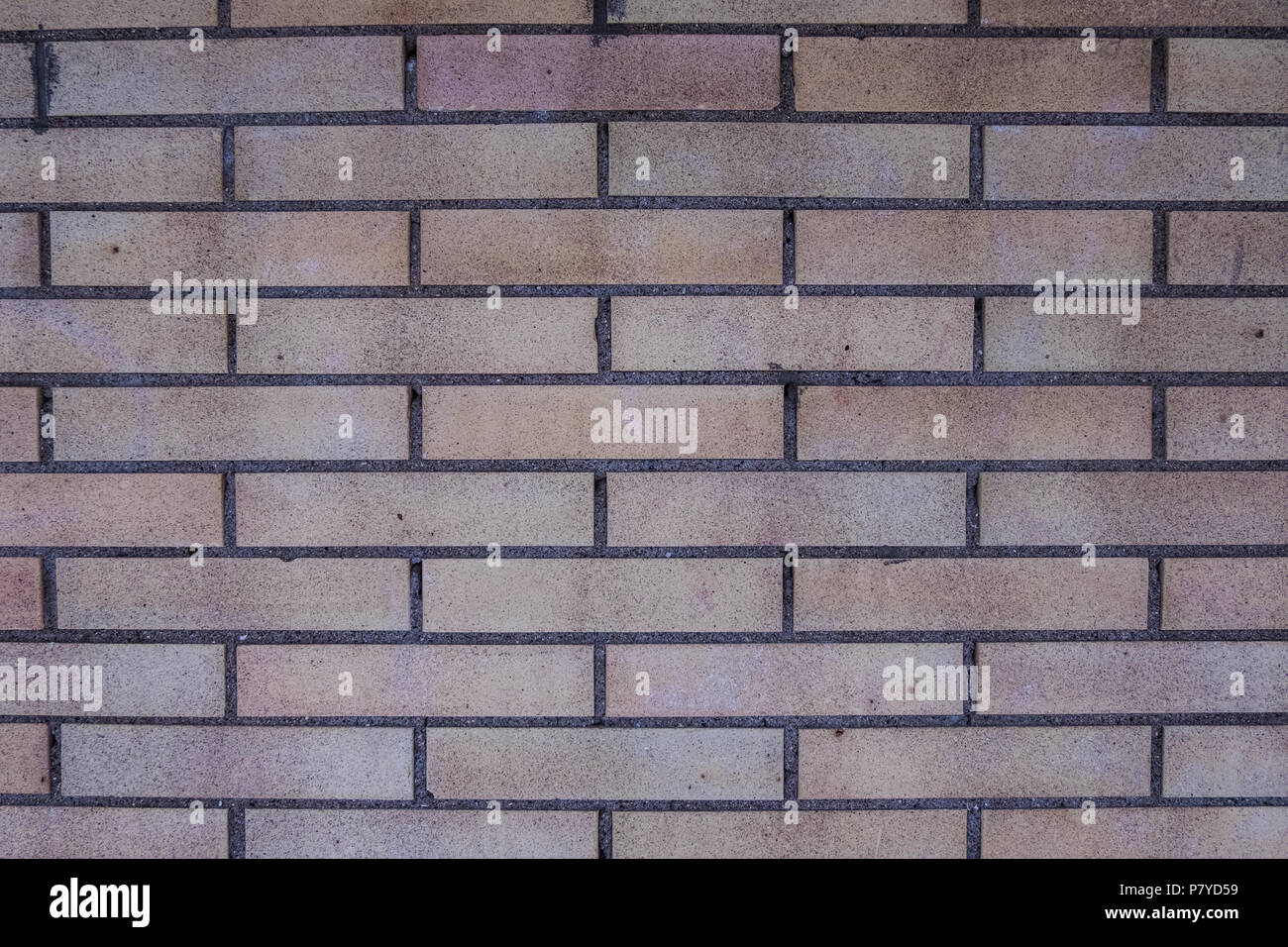 Pale yellow brick wall texture background Stock Photo - Alamy