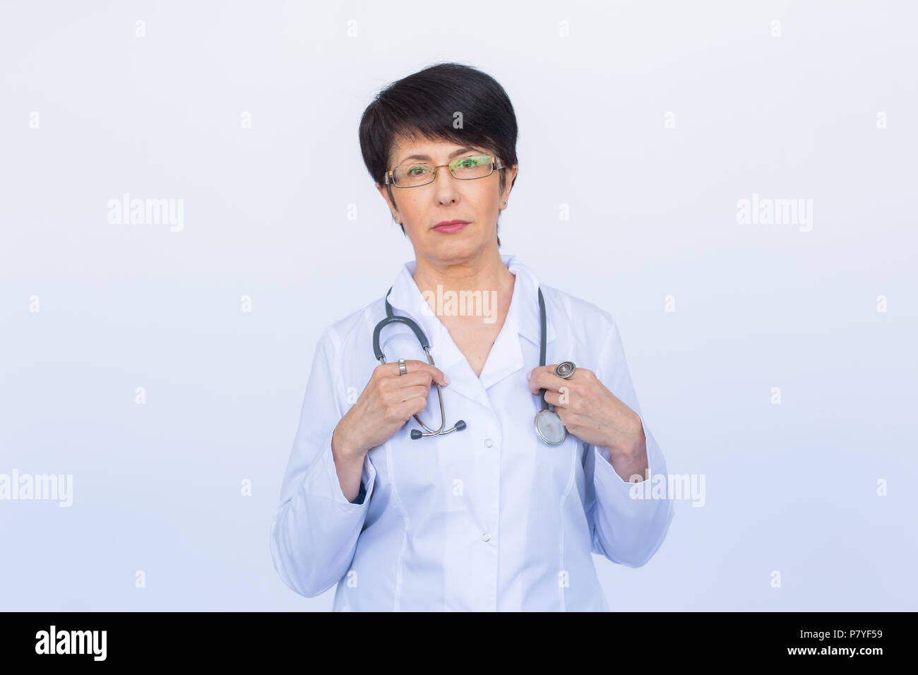 Doctor woman smile face with stethoscope over white background Stock ...