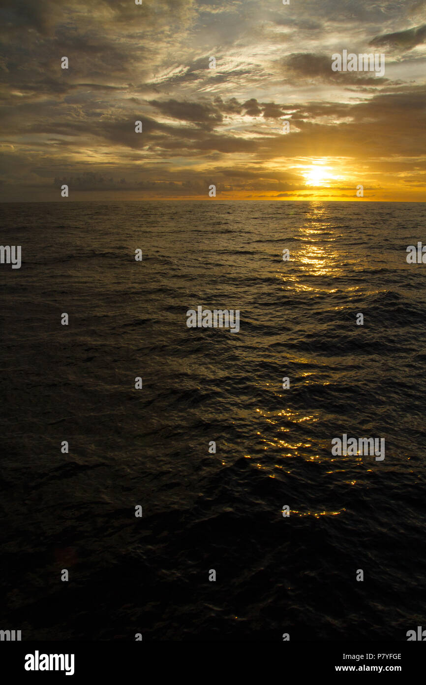 Advertising, Travel, Vacation and Holiday Concept - Beautiful sunset on ...