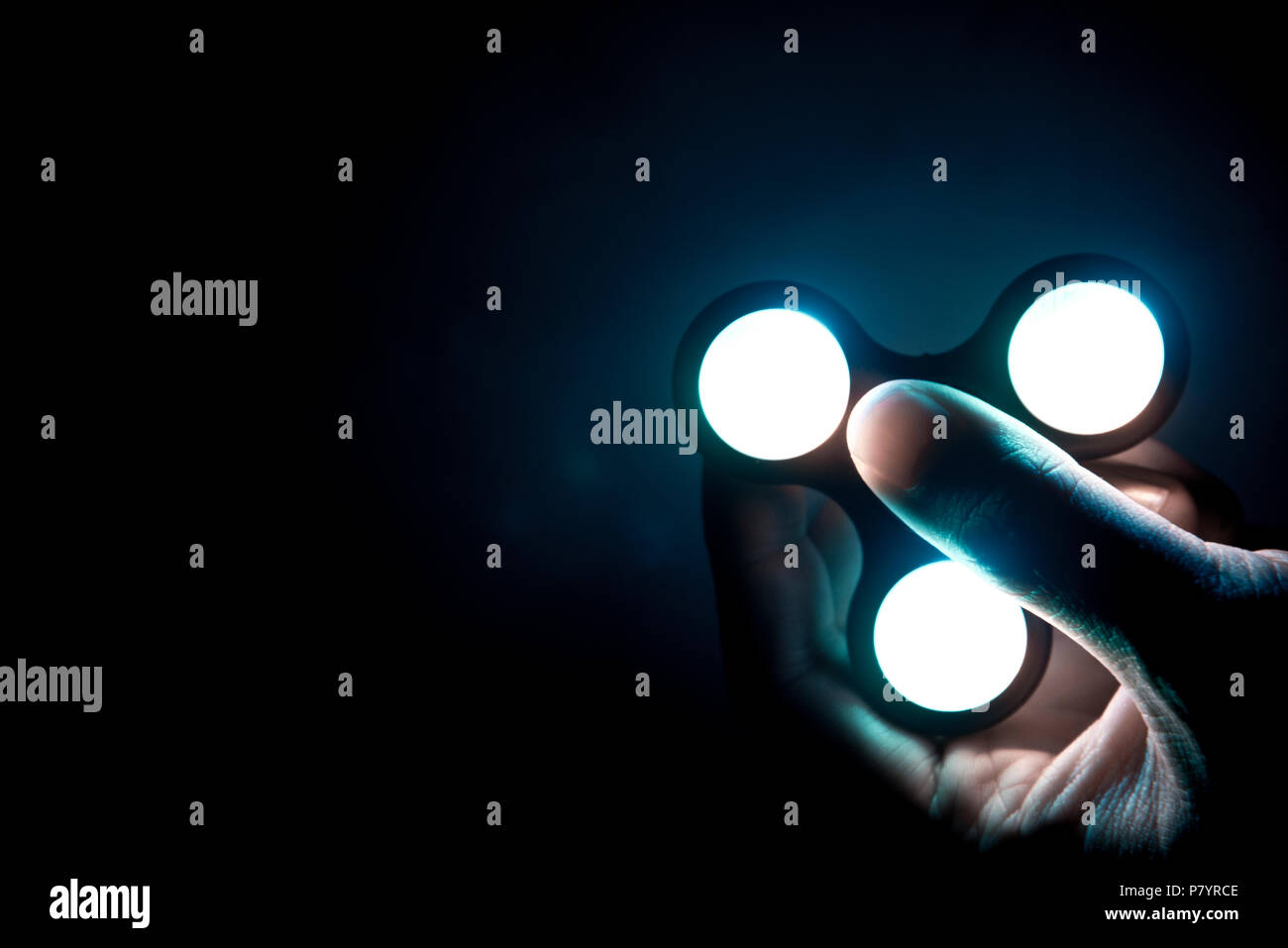 Fidget spinner toy with neon light consist of ball-bearing made from ...