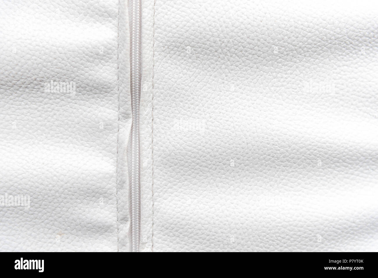 White leather with zip background. Wallpaper and Texture concept. Close ...