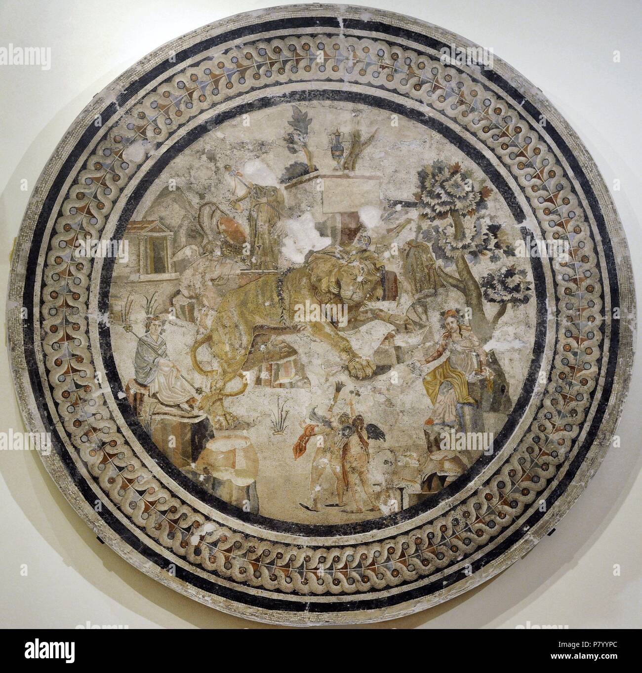 Round Roman mosaic of a lion and Cupids between Dionysus and Maenad ...