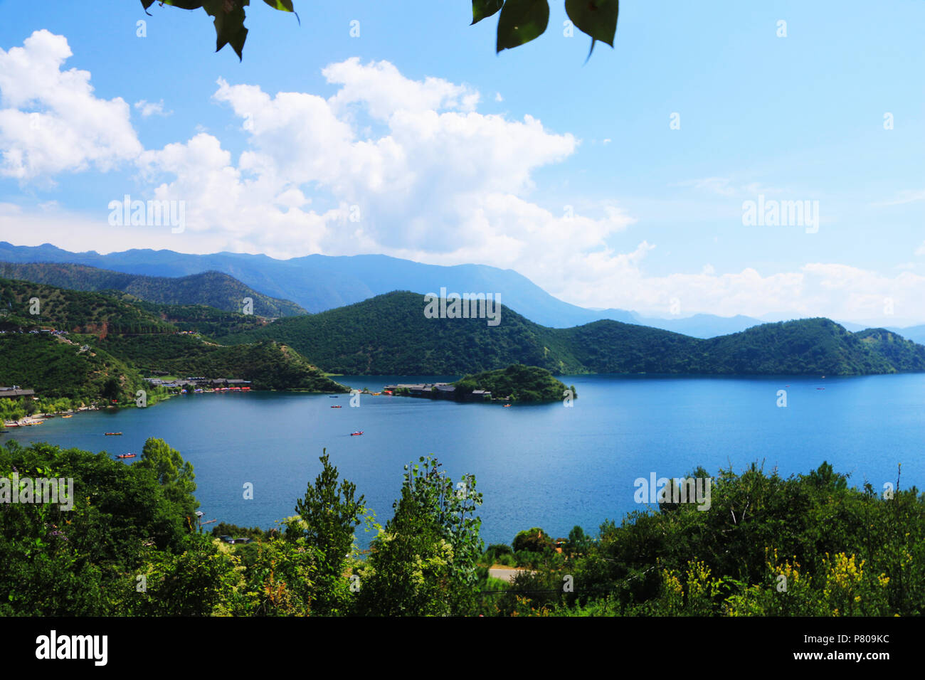 Scenery of lugu lake in lijiang, yunnan, China Stock Photo - Alamy