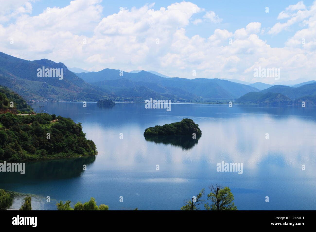 Scenery of lugu lake in lijiang, yunnan, China Stock Photo - Alamy