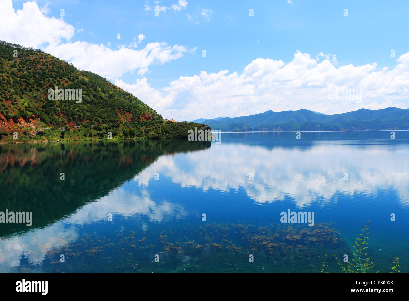Scenery of lugu lake in lijiang, yunnan, China Stock Photo - Alamy