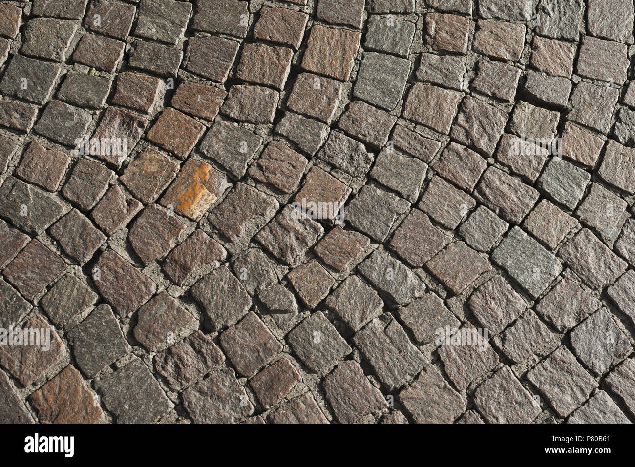 scenic rough cobblestone pavement fragment from Milan, Italy Stock ...