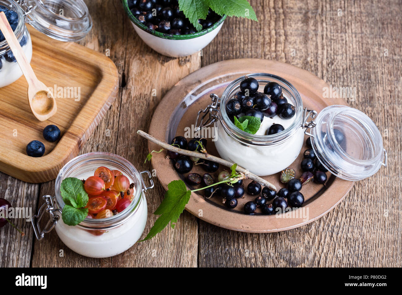 Cheesecake creme parfait with fresh summer fruits in jar, healthy ...