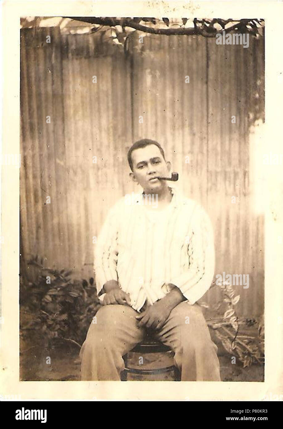 English: Quintin O'Connor at age 31 smoking his pipe . 1939 324 Quintin ...