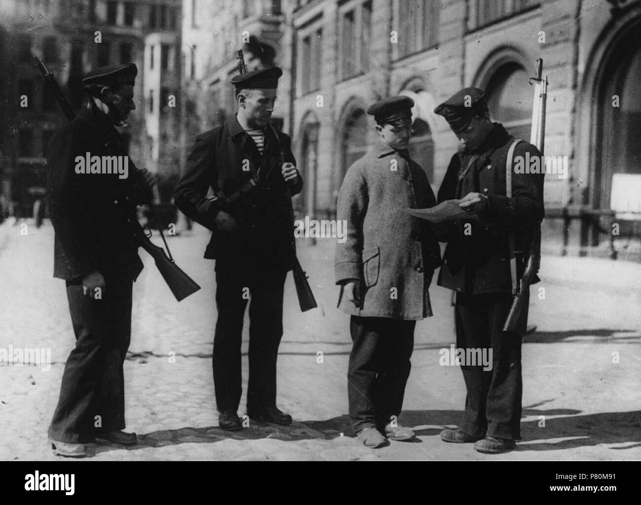 English: Red Guards checking documents : . November 1917 (October 1917 ...