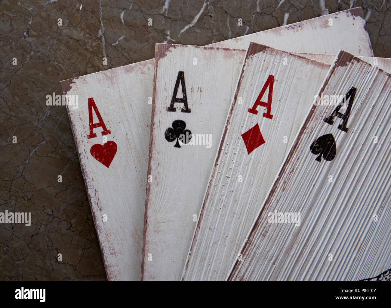 Wooden playing cards aces for decoration Stock Photo - Alamy