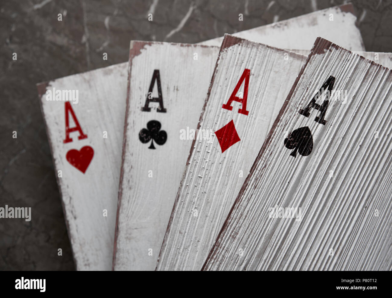 Wooden playing cards aces for decoration Stock Photo - Alamy