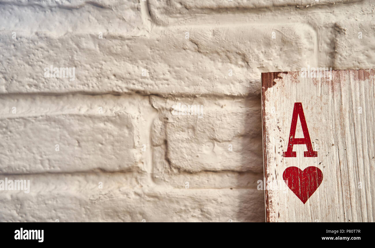 Wooden playing cards aces for decoration Stock Photo - Alamy
