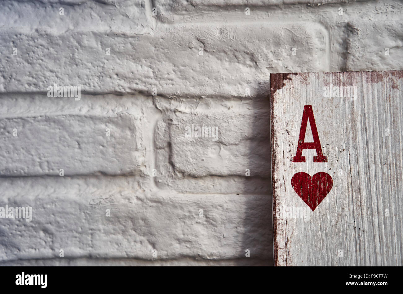 Wooden playing cards aces for decoration Stock Photo - Alamy