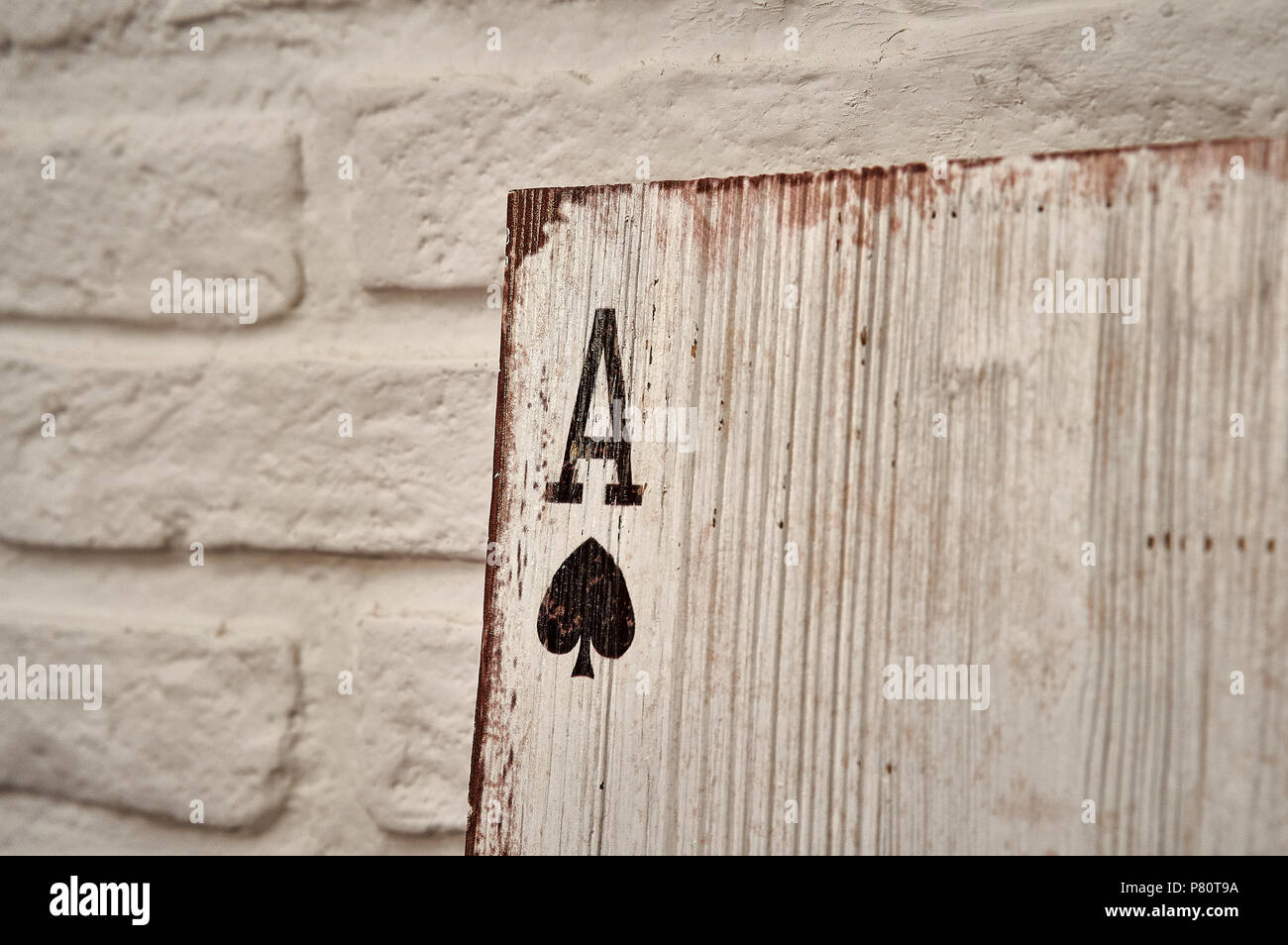 Wooden playing cards aces for decoration Stock Photo - Alamy