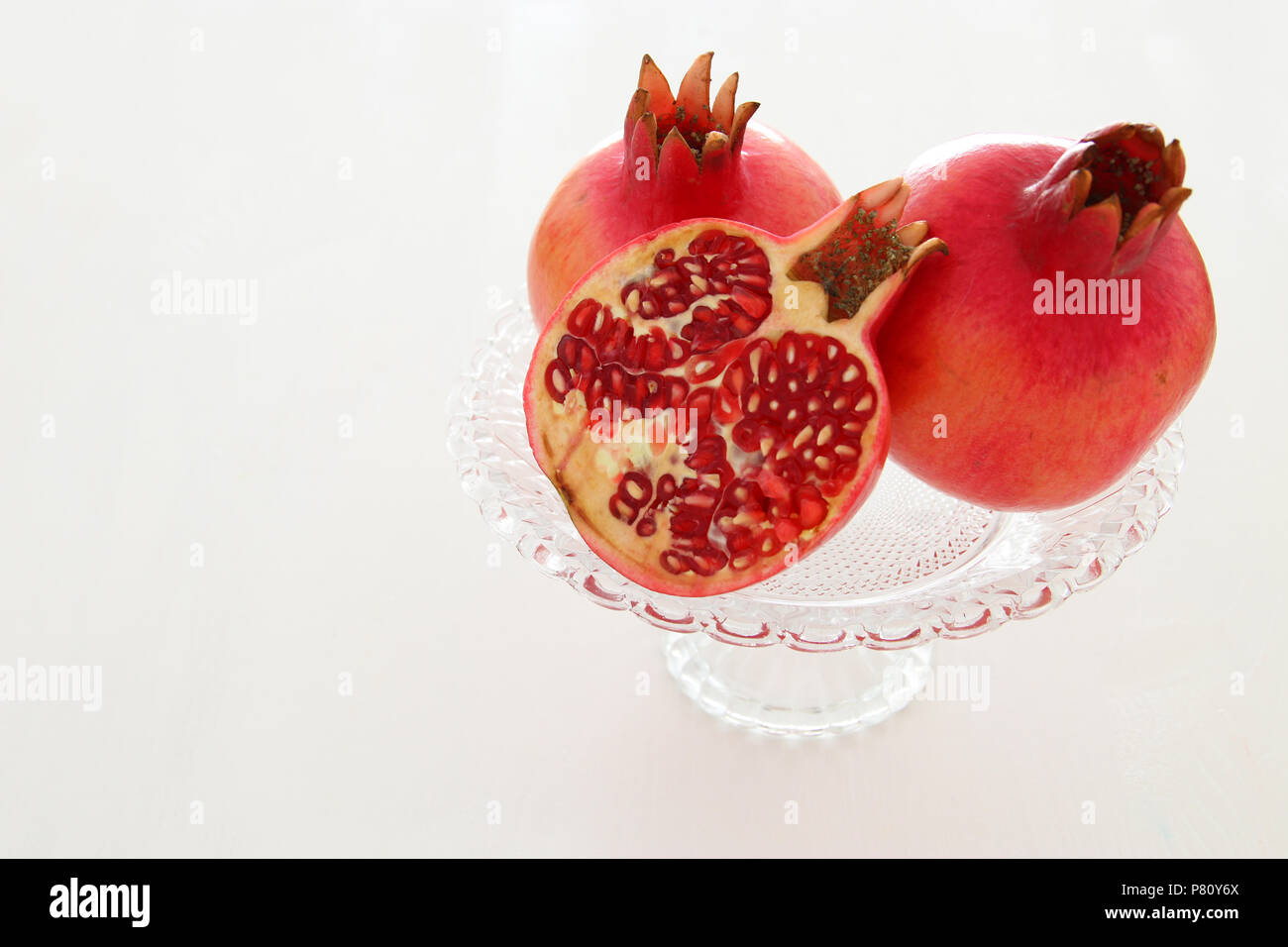 Rosh hashanah (jewish New Year holiday) concept. Pomegranate raditional ...