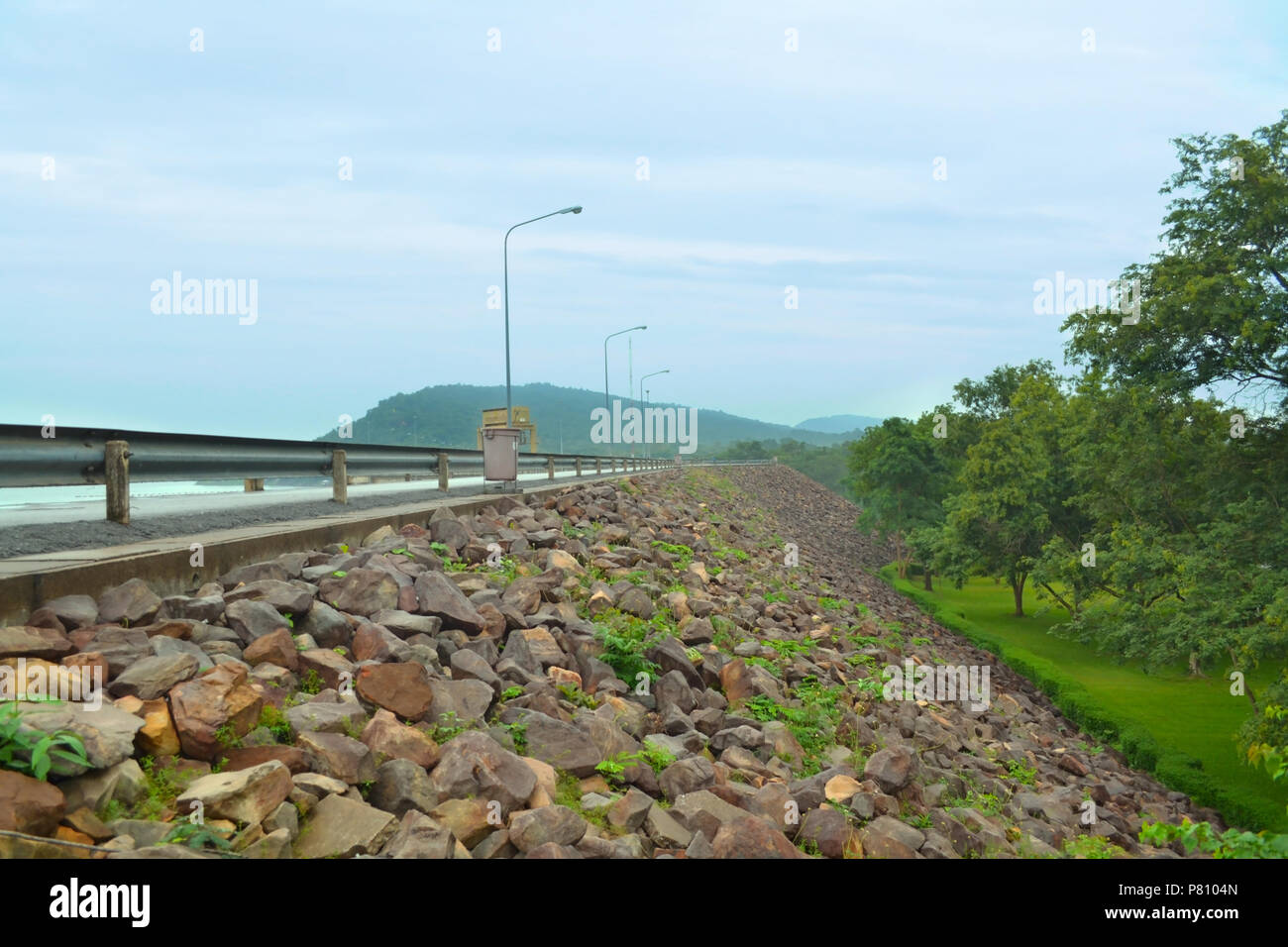 Landscape of the dam in the fog morning Stock Photo - Alamy