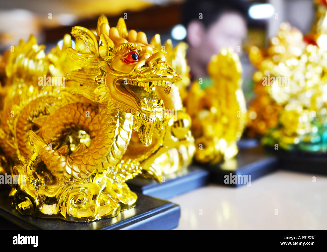 Golden dragon statue Stock Photo - Alamy
