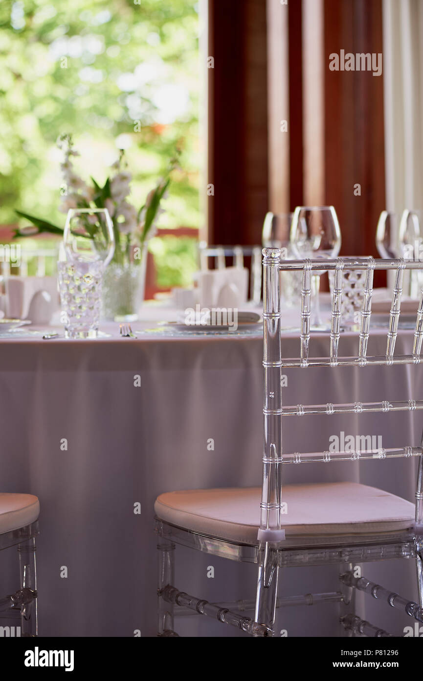 Transparent light chairs at the Banquet.Specific. Weightless ...