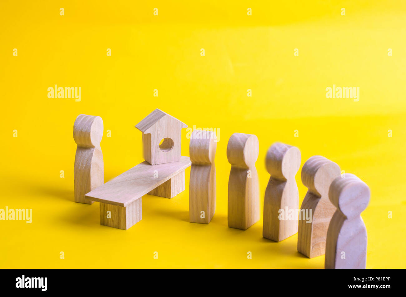 The seller is behind the counter and serves customers. A queue of ...