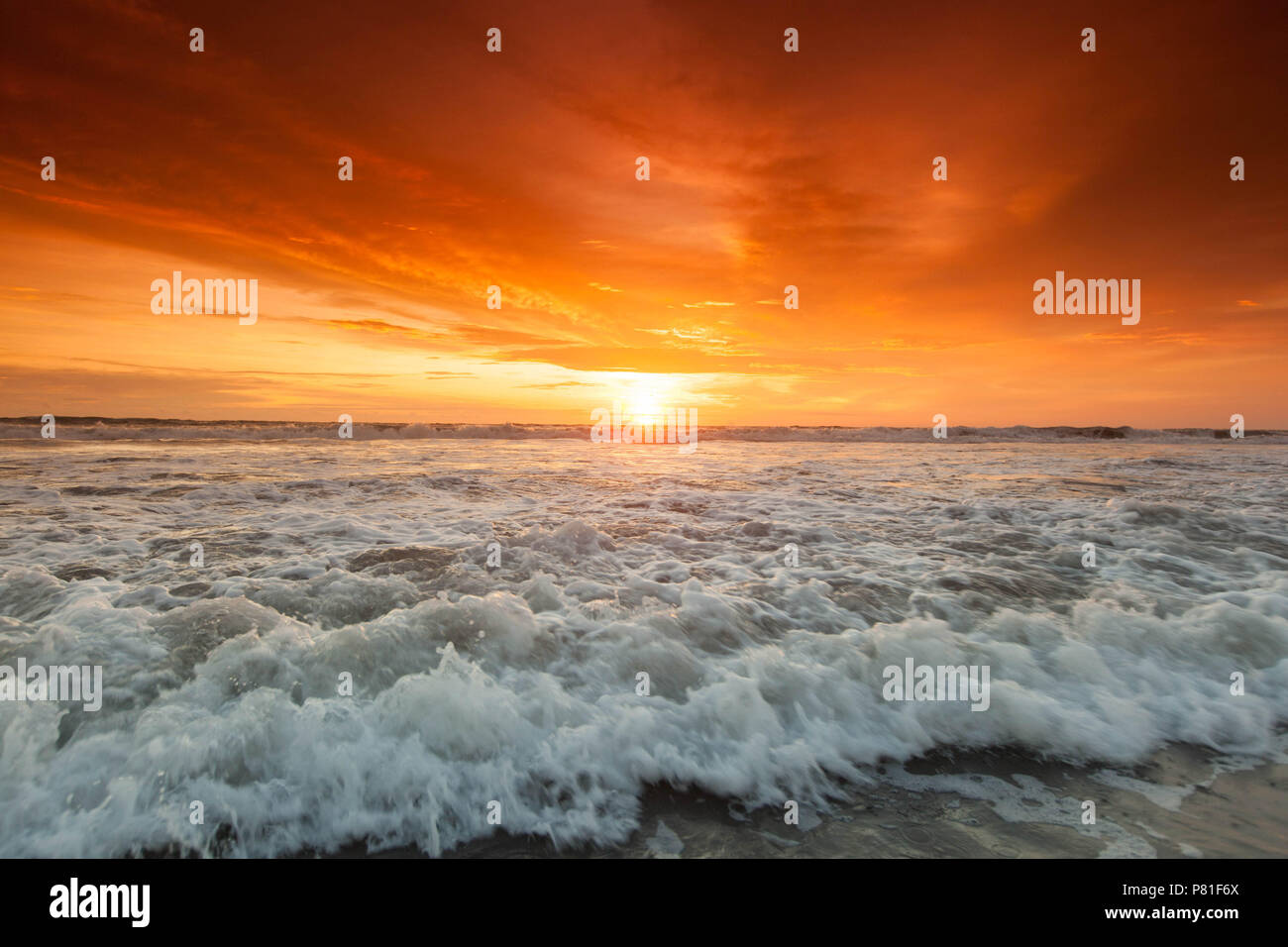Radiant colorful sea beach sunset on Bali, Indonesia Stock Photo - Alamy