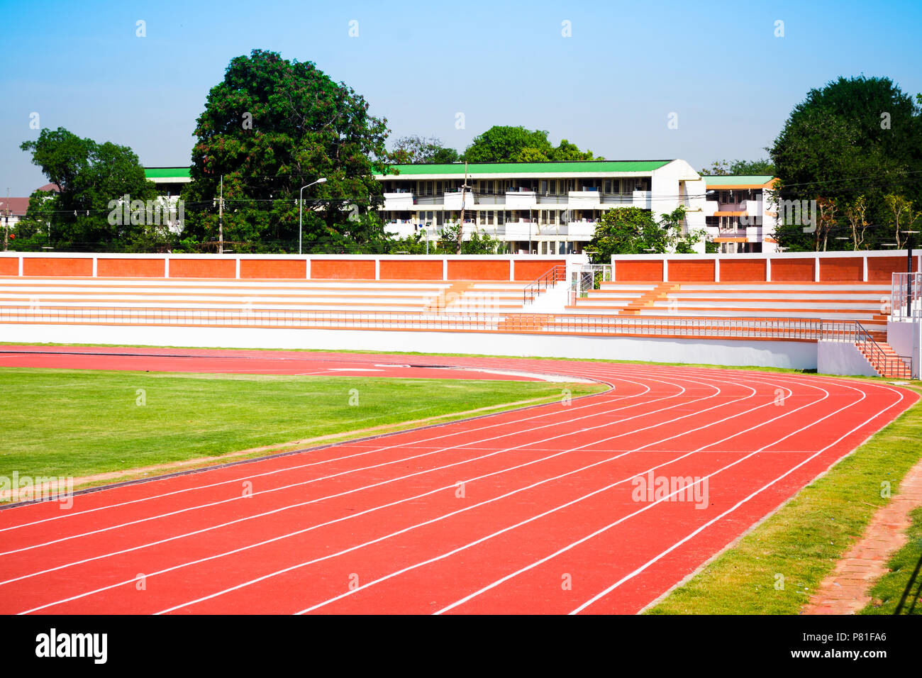 track and field for running sport in stadium with blue sky Stock Photo ...
