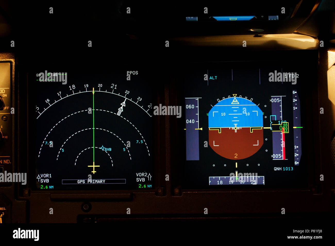 Light from a plane control room in the dark Stock Photo - Alamy