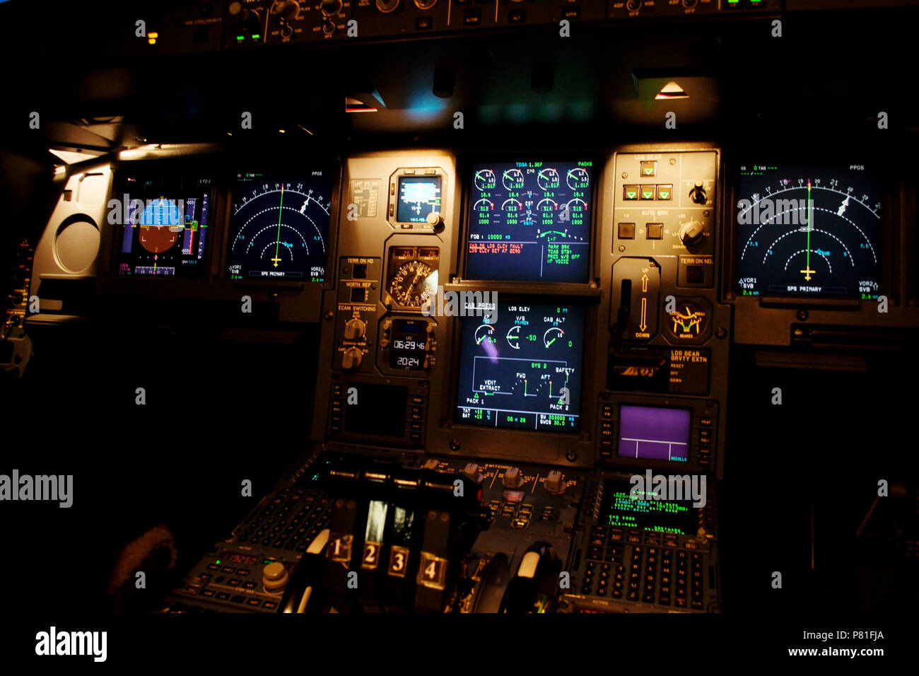 Light from a plane control room in the dark Stock Photo - Alamy