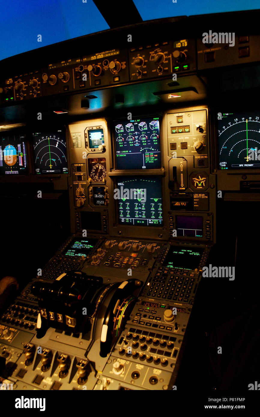 Light from a plane control room in the dark Stock Photo - Alamy