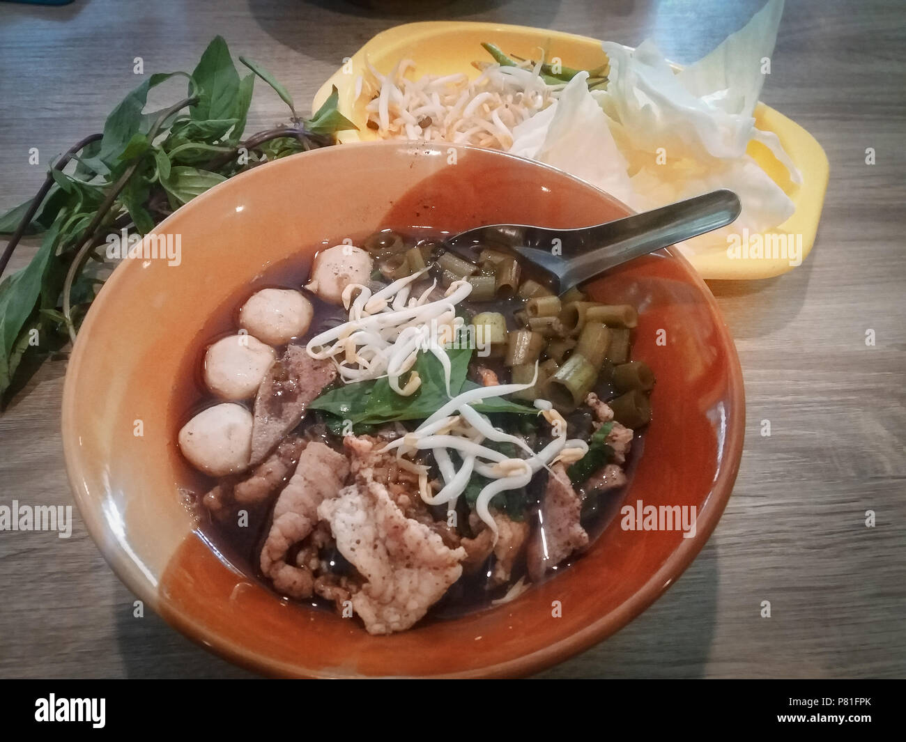 Overhead view of Kuay teow reua or thai boat noodles, authentic local ...