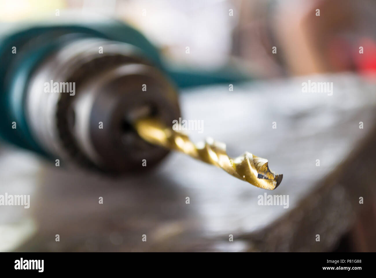 Drill head of gold for industrial applications Stock Photo - Alamy