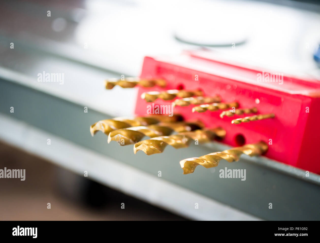 Drill head of gold for industrial applications Stock Photo - Alamy