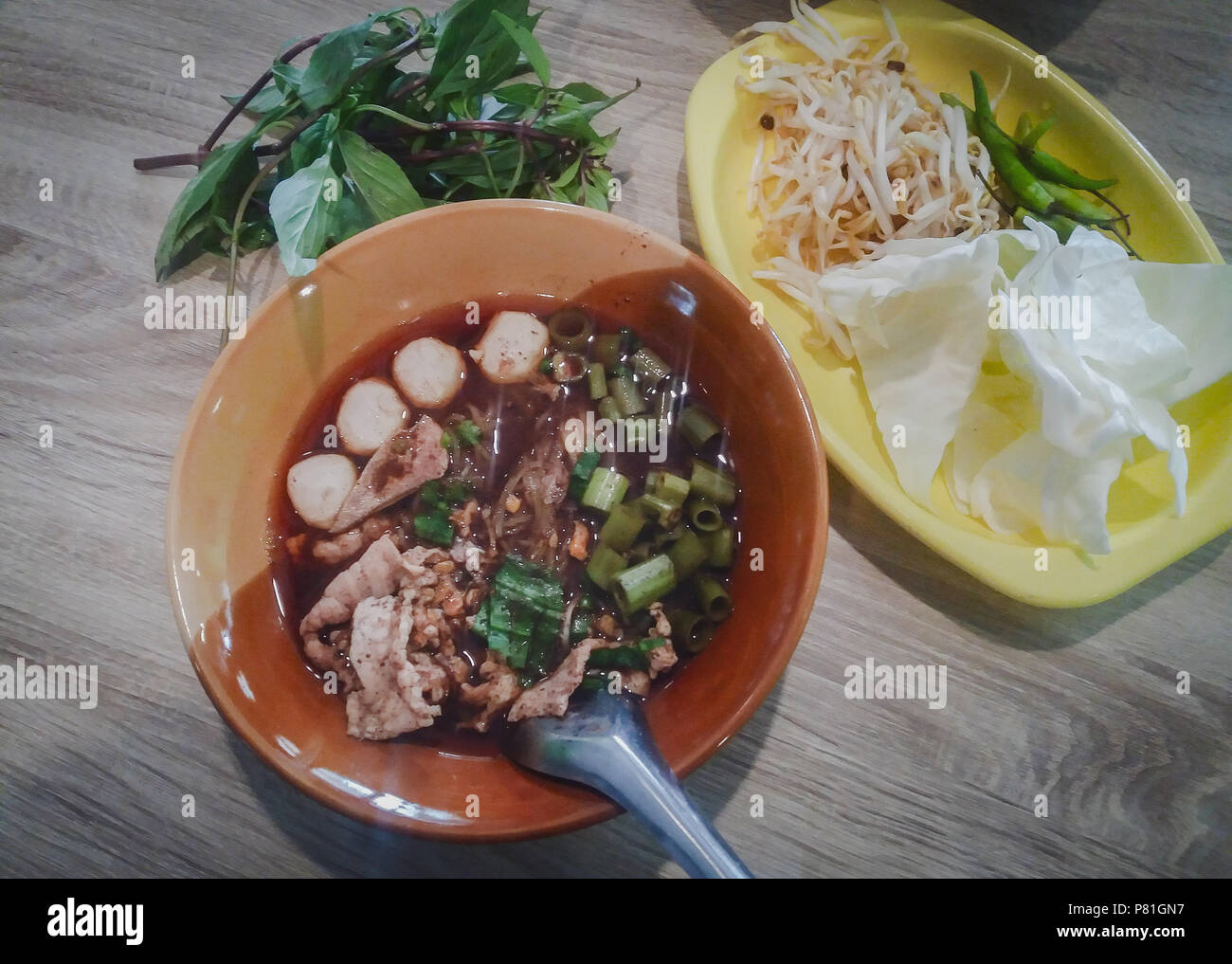 Overhead view of Kuay teow reua or thai boat noodles, authentic local ...