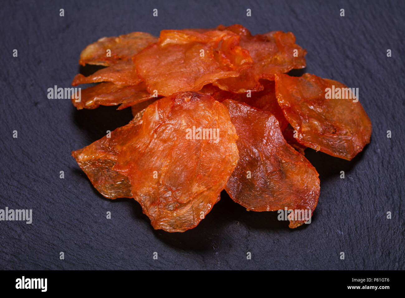 Dry chicken meat over wooden Stock Photo - Alamy